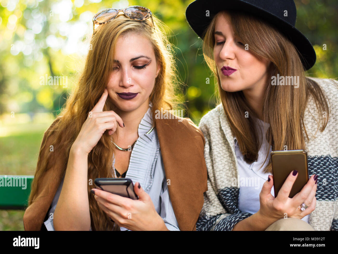 Women friends gossip face to face hi-res stock photography and images ...
