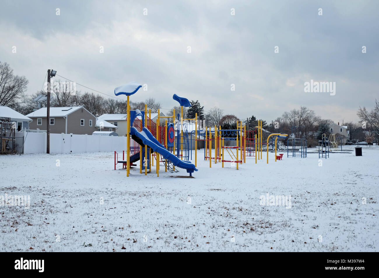 Playground in the winter covered in snow Stock Photo - Alamy