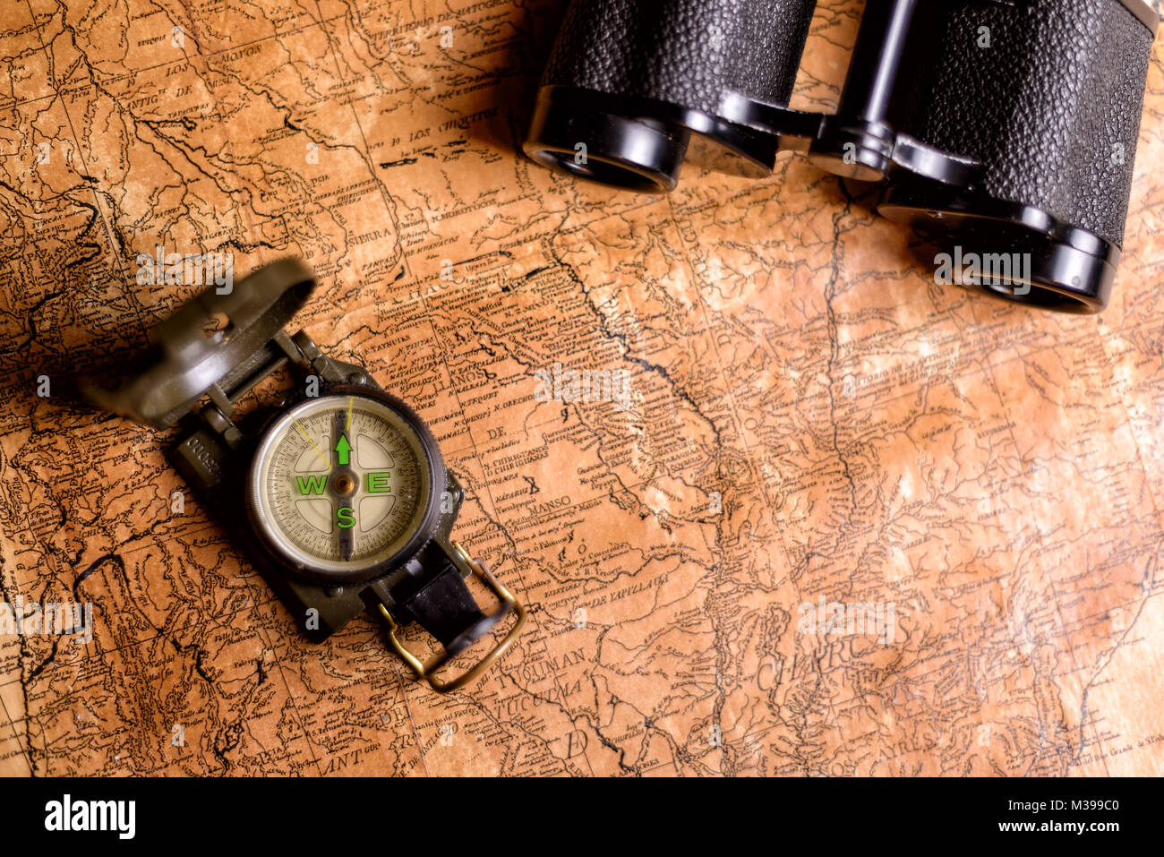 old expedition map with compass and binoculars Stock Photo - Alamy