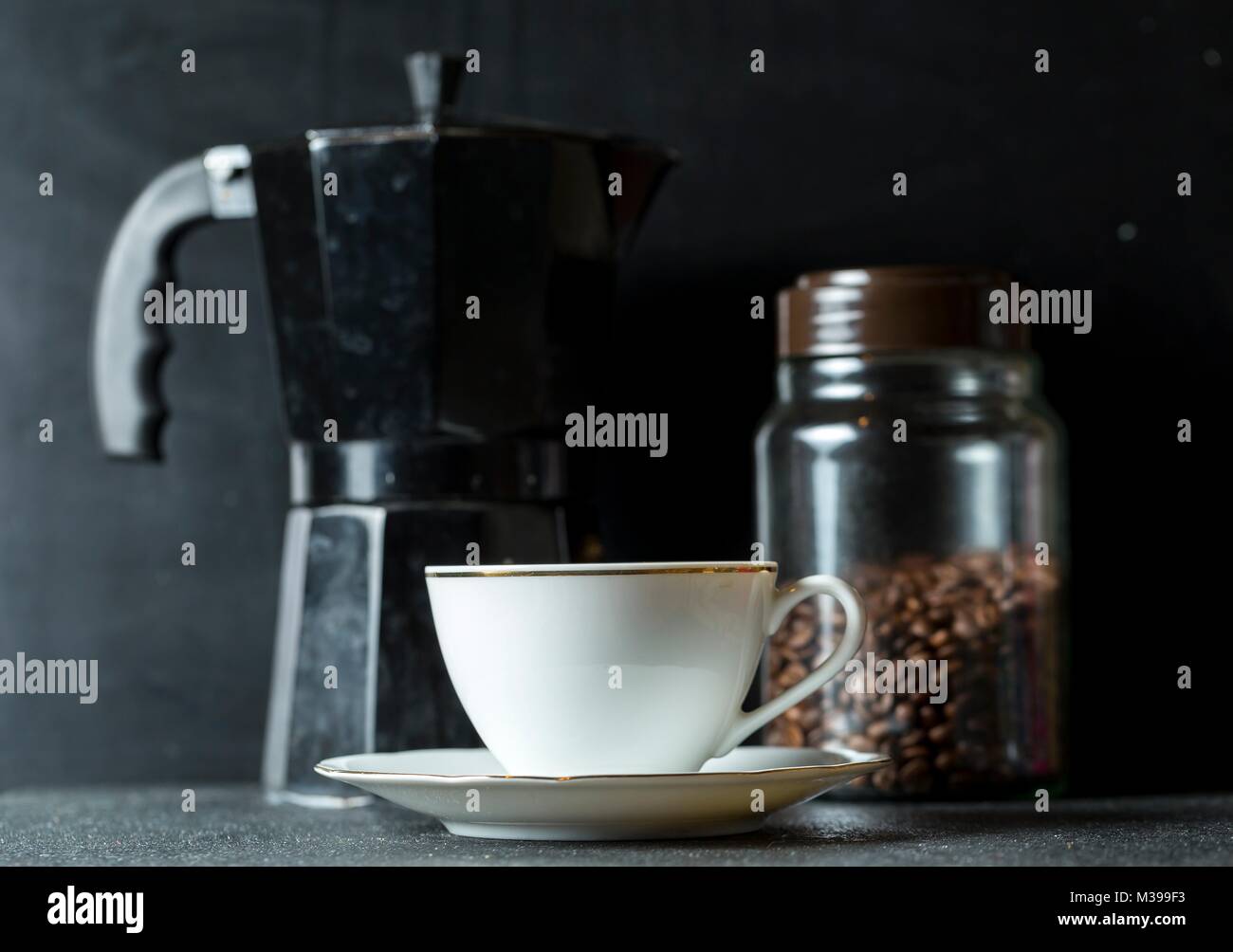 Coffee composition with tools for preparing espresso on dark background ...