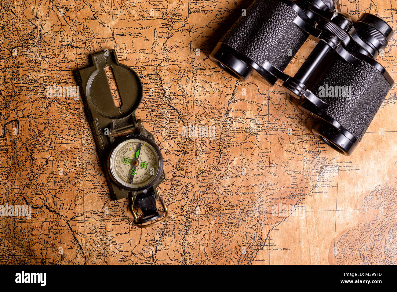 old expedition map with compass and binoculars Stock Photo - Alamy