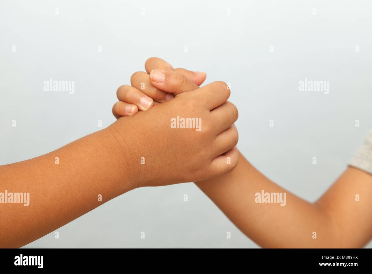 Children handshaking hands Stock Photo - Alamy