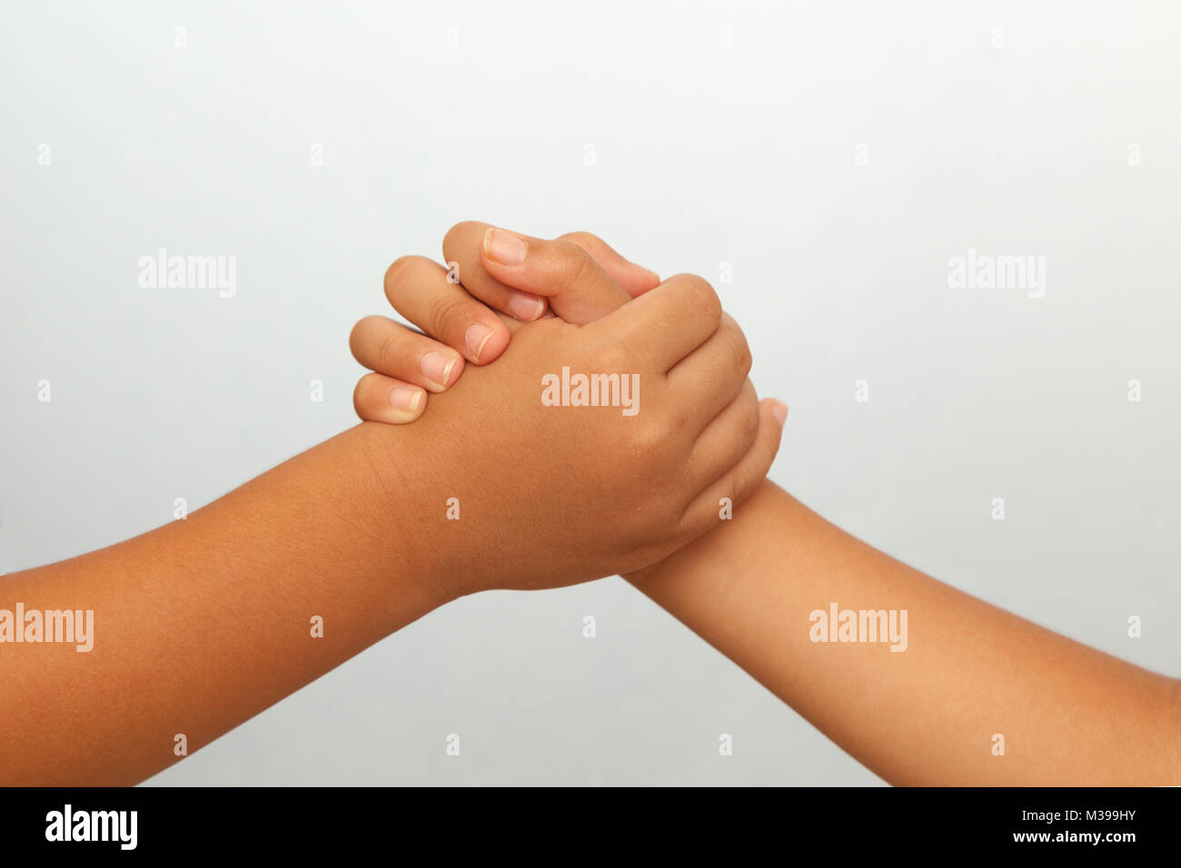 Children handshaking hands Stock Photo - Alamy
