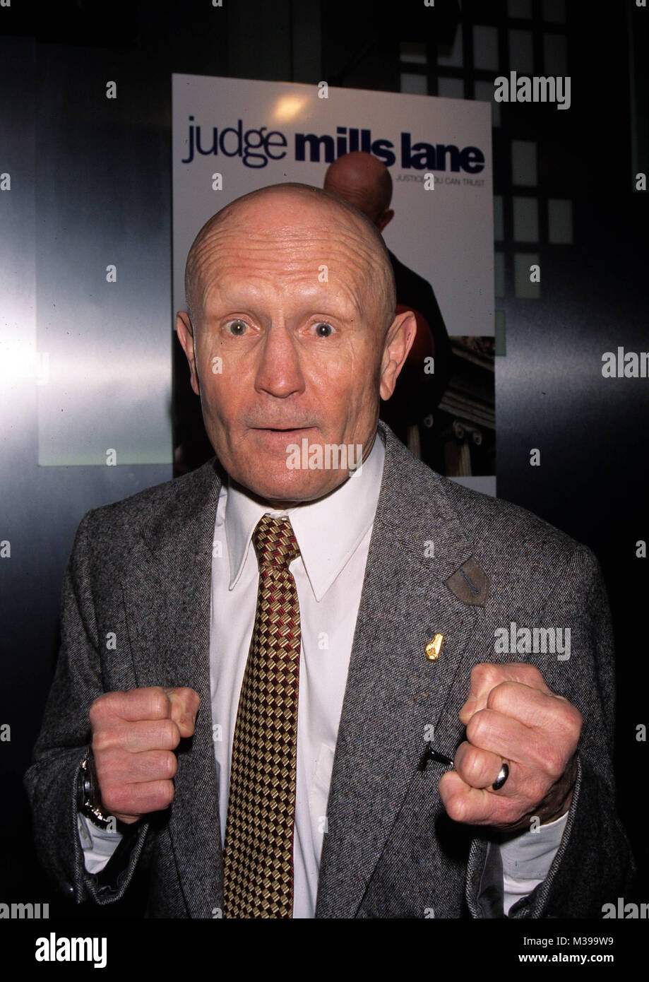 Mills Lane photographed by Walter McBride attending the 1999 NATPE ...