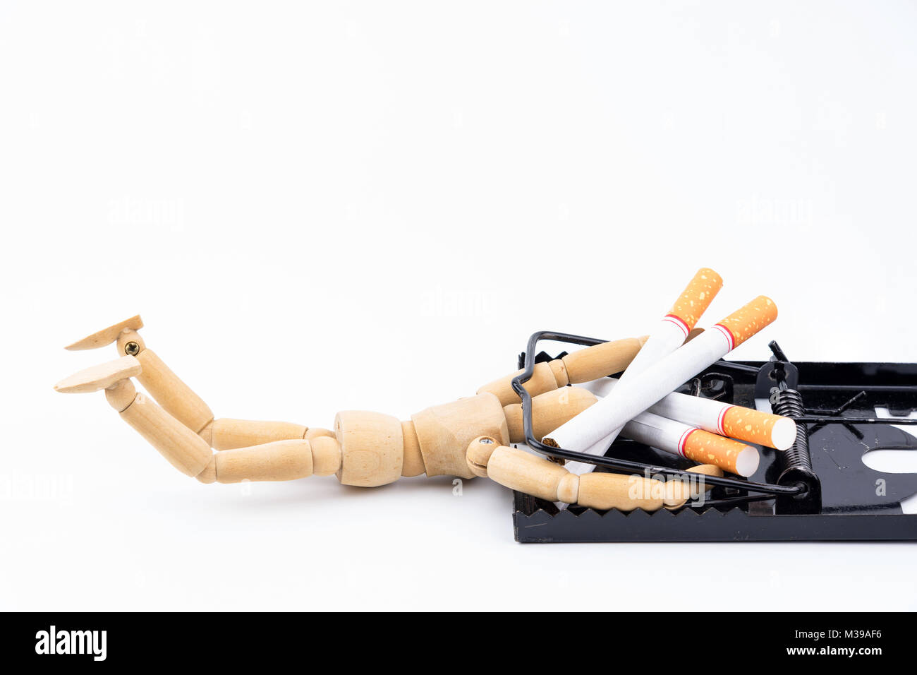 Wooden puppet caught in Mousetrap with cigarettes as bait.No Smoking ...