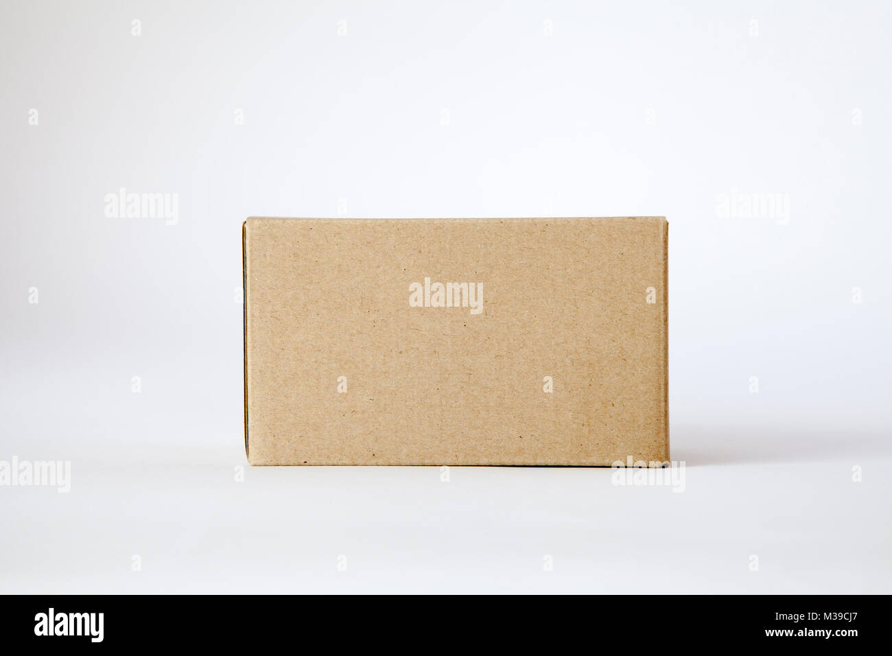 Luggage in the box of cardboard boxes Stock Photo - Alamy