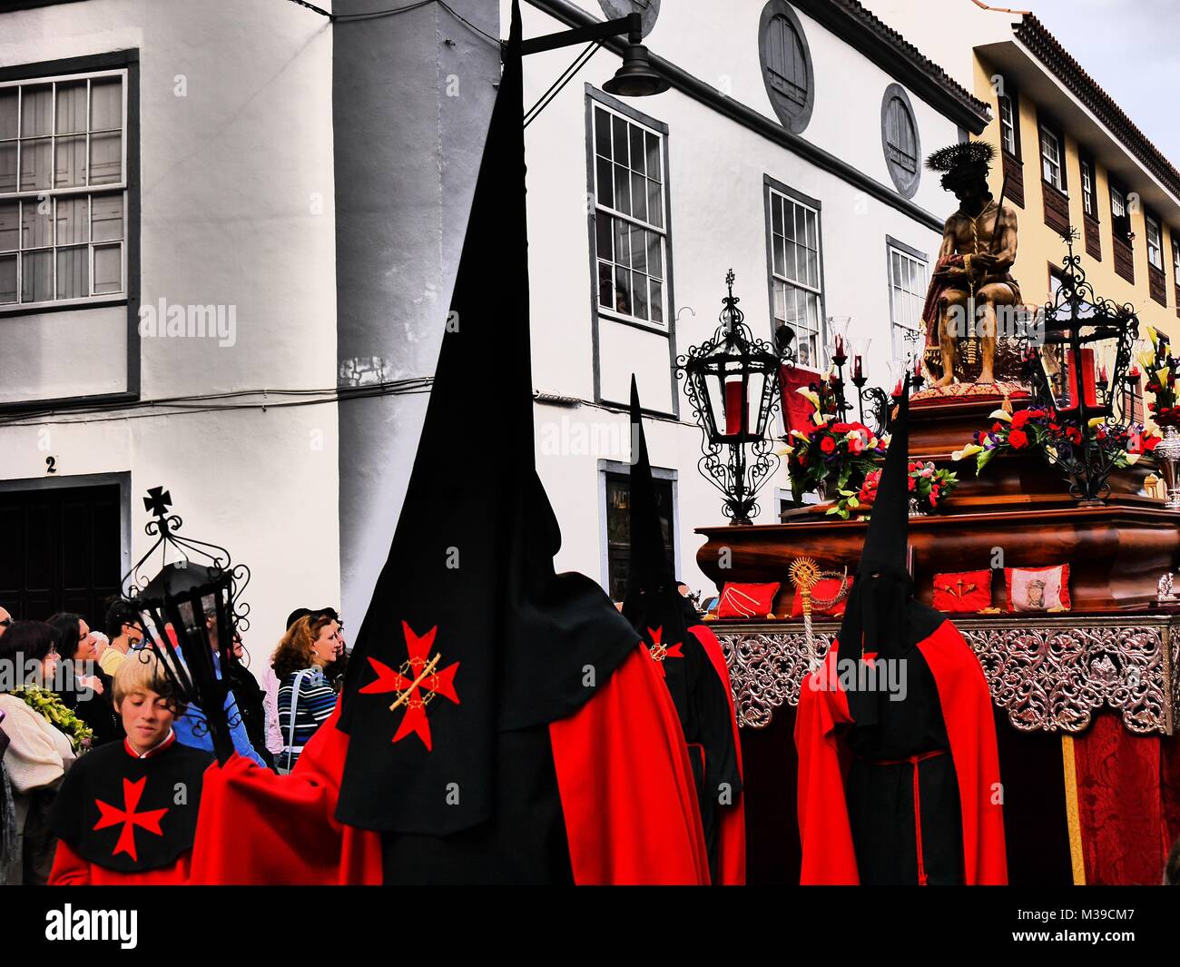 Black hoods hi-res stock photography and images - Alamy