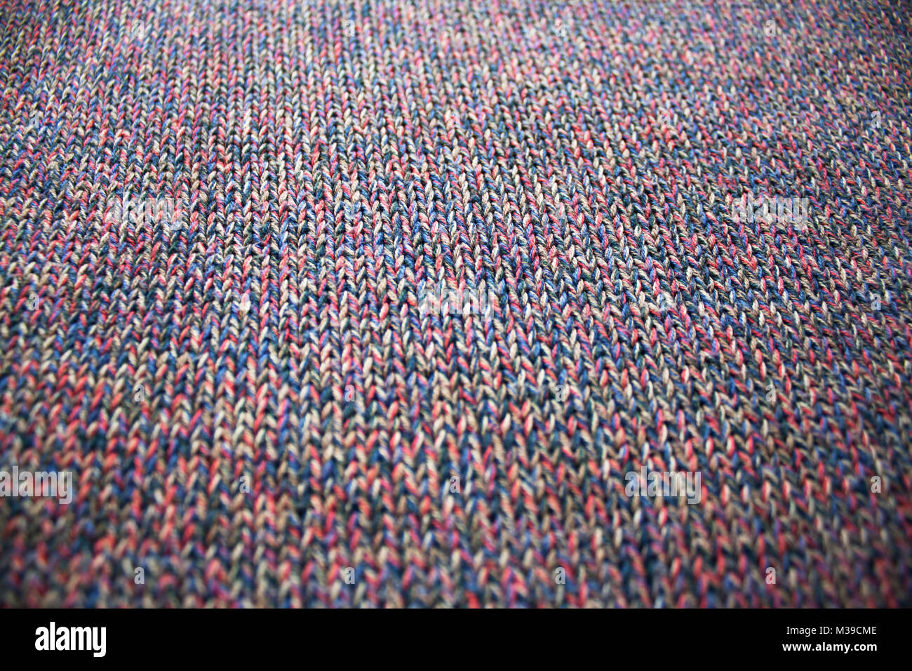 Multicolor knitted textile abstract background Stock Photo - Alamy