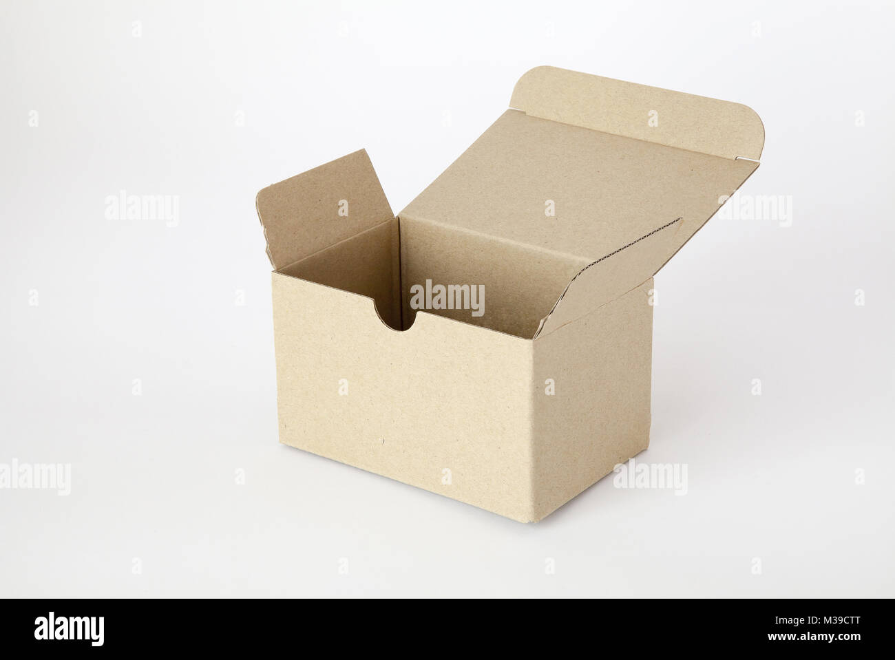 Luggage in the box of cardboard boxes Stock Photo - Alamy