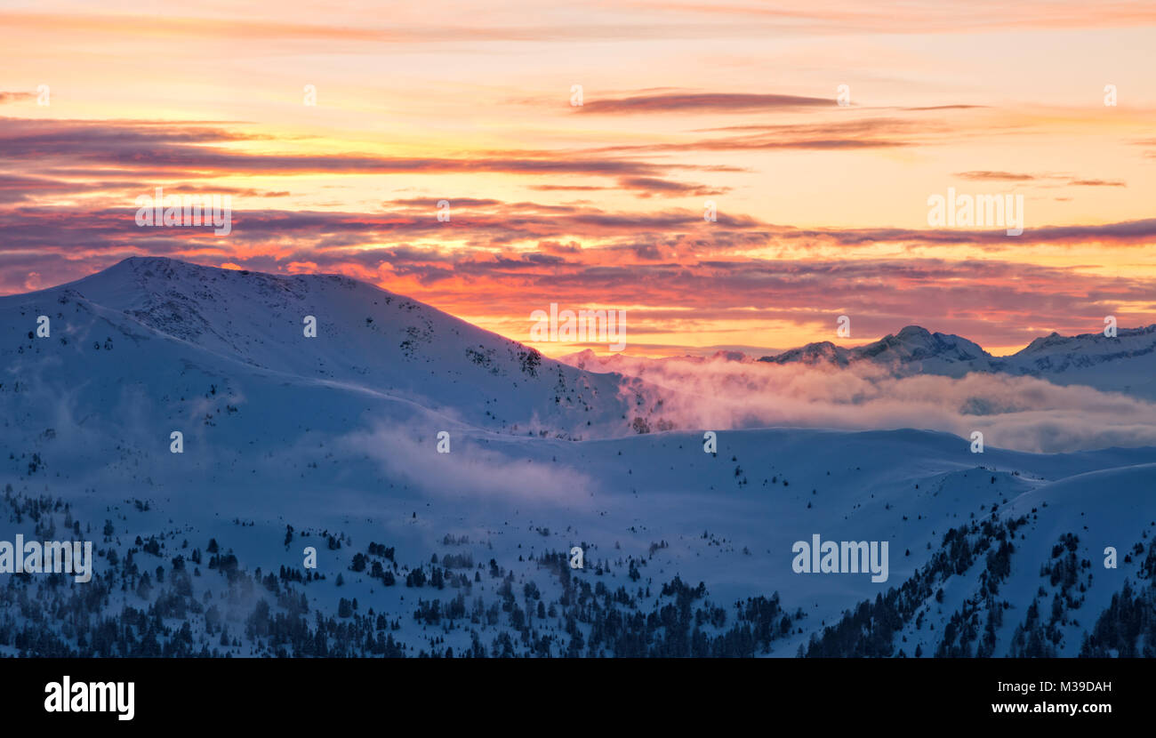 Beautiful panoramic Alpine landscape in sunset light. Winter outdoor ...