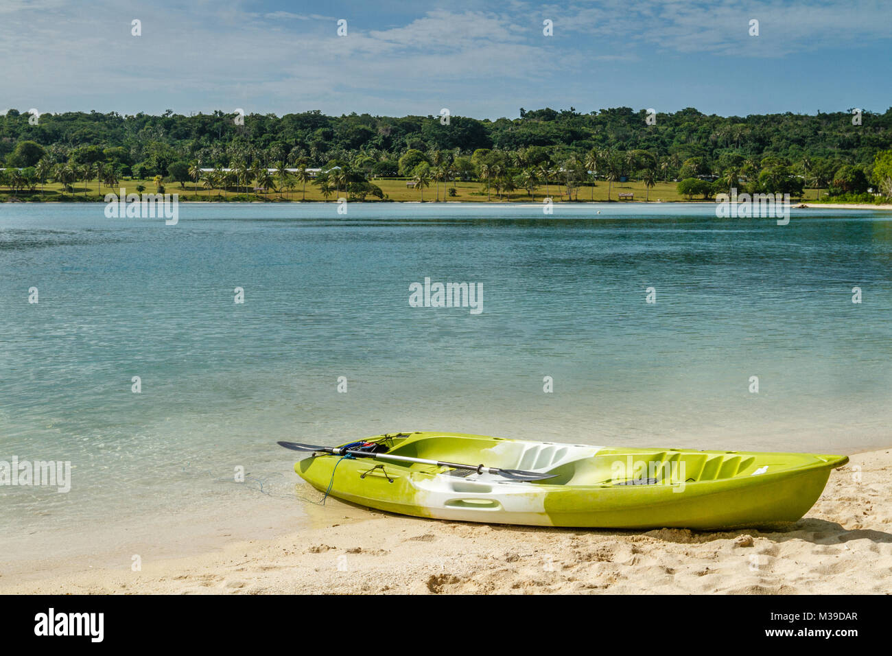 Kayak laying on the beach. Ratua Private Island, Republic of Vanuatu ...
