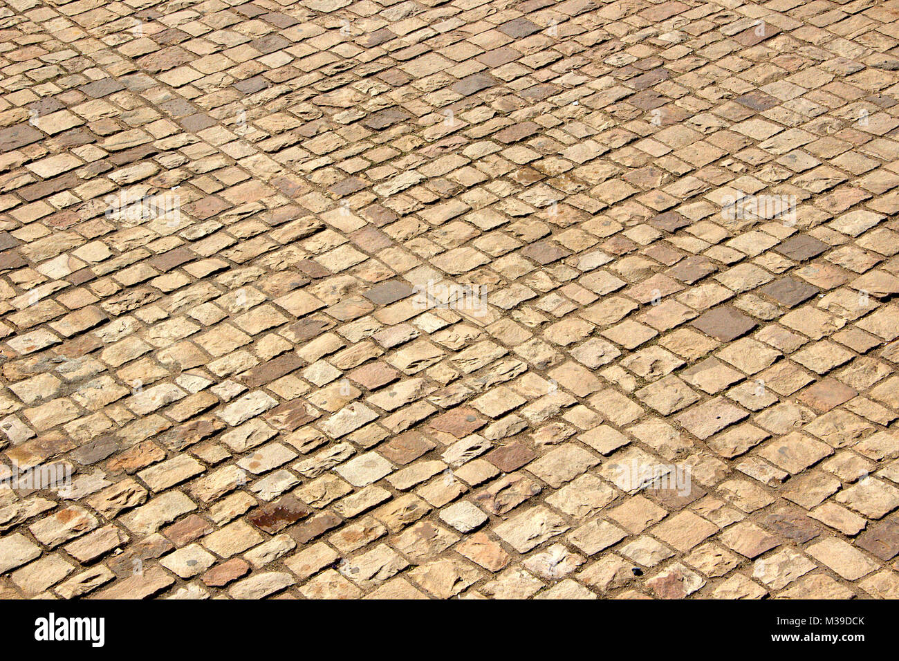 Diagonal view of beautifully patterned dressed stone pavement Stock ...