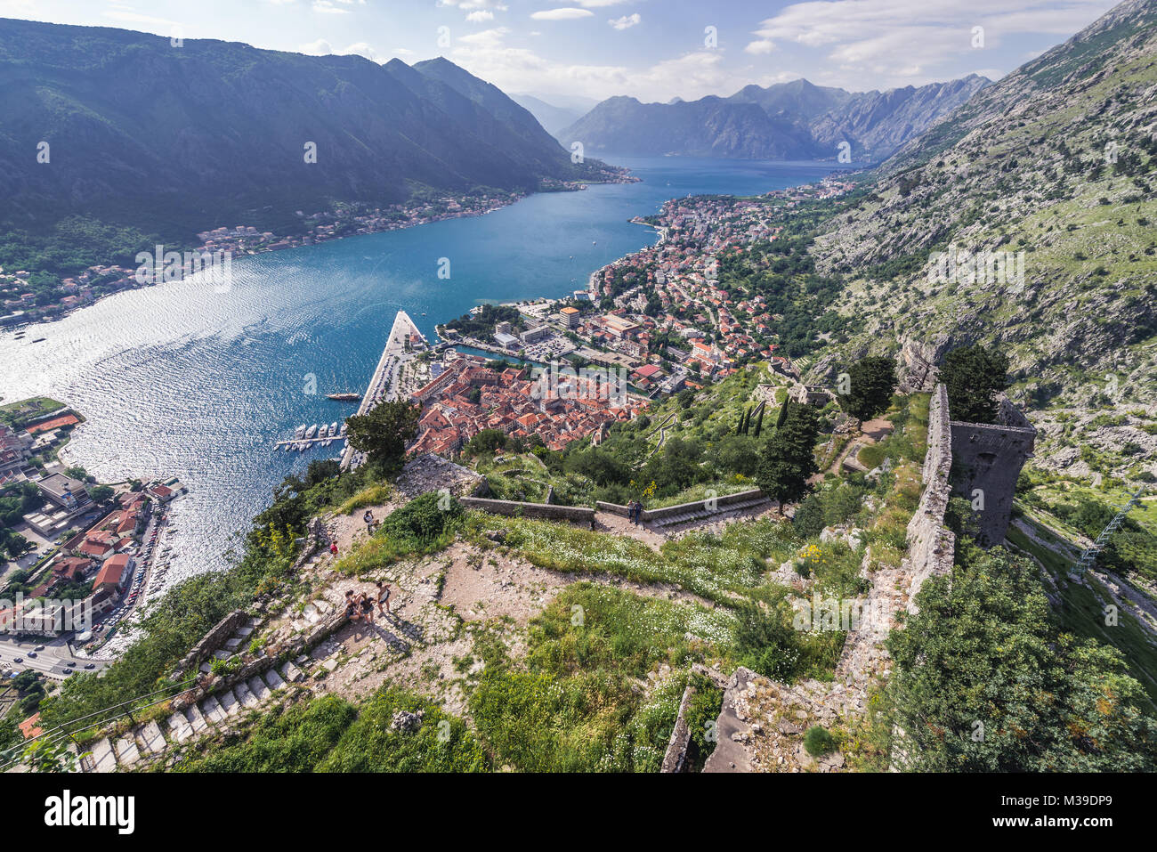 Aerial view from ancient walls above Kotor coastal city, located in Bay ...