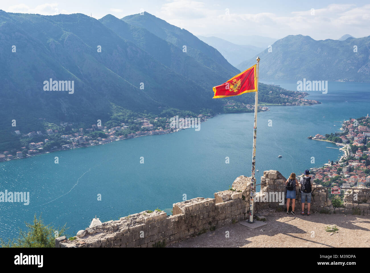 Montenegrin flag on the top of Saint John Fortress ruins above Kotor ...