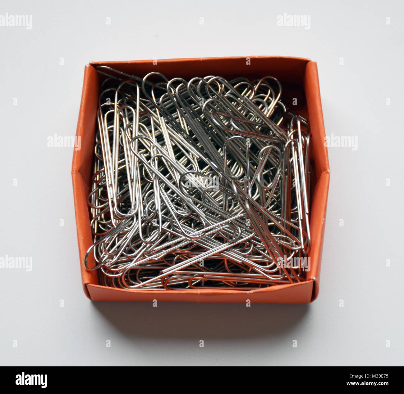 Stationery boxes filled with elastic bands, paper clips, staples and ...