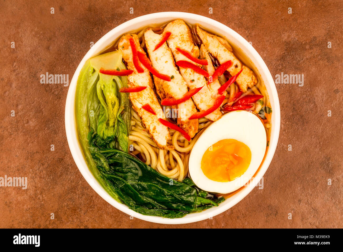 Japanese Style Chicken And Chilli Ramen Soup or Broth With Pak Choi On ...