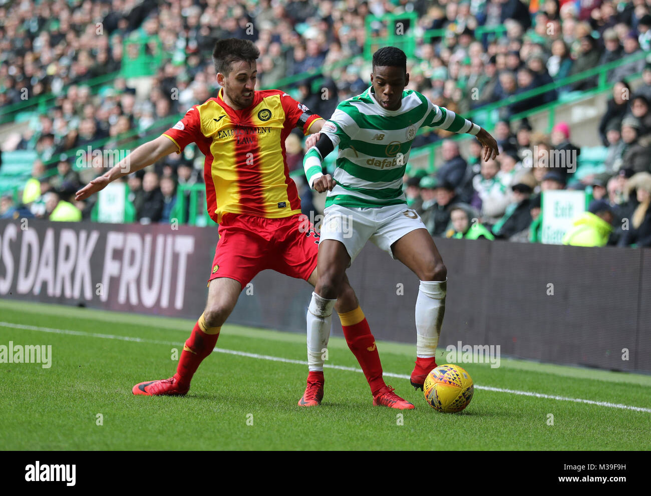 Celtic's Charlie Musonda (right) and Partick Thistle's Callum Booth during the William Hill ...
