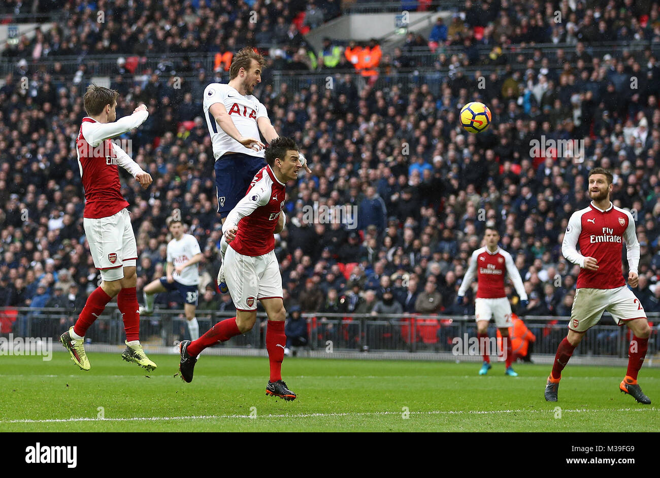 Tottenham Hotspur's Harry Kane (second left) scores his side's first ...