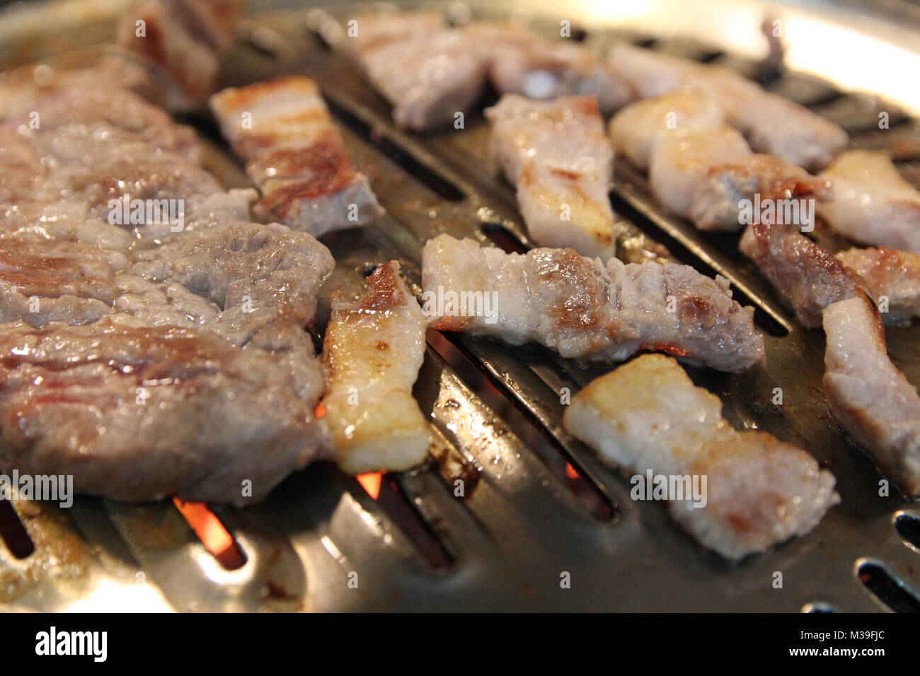 Korean grilled pork BBQ (Samgyeopsal-gui) with charcoal at Korean ...