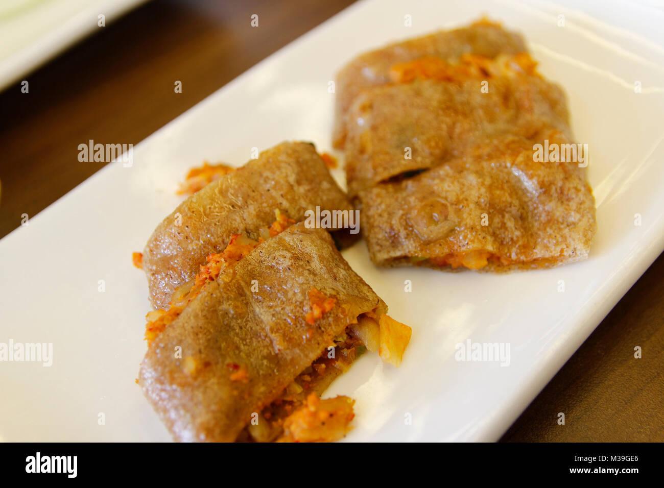 Korean spring roll with kimchi and vegetable at Korean restaurant ...