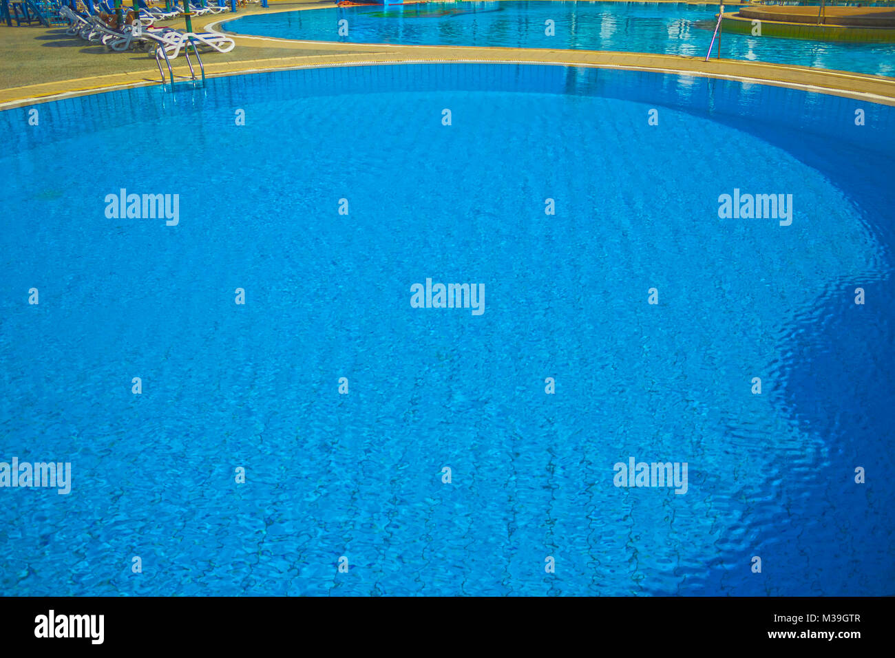 sunshine and clear water of swimming pool Stock Photo - Alamy