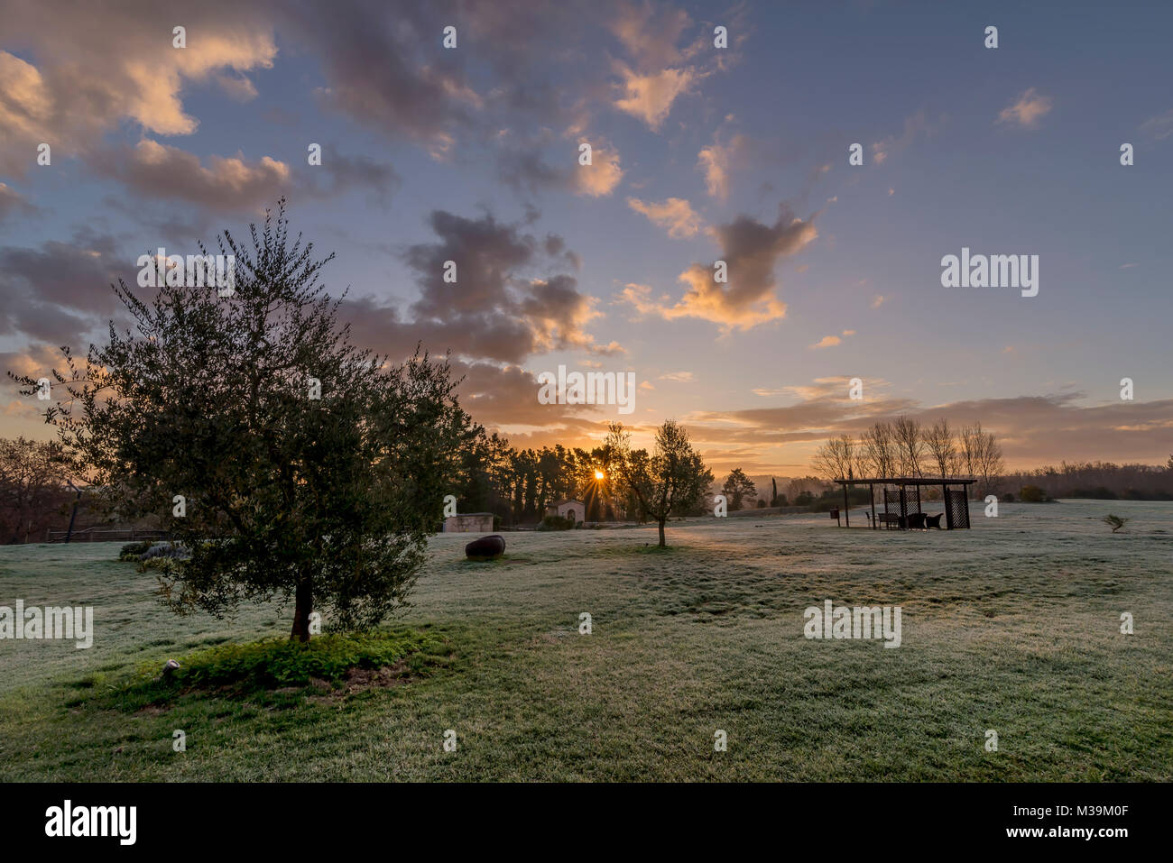 Blazing winter dawn on the Tuscan countryside Stock Photo - Alamy