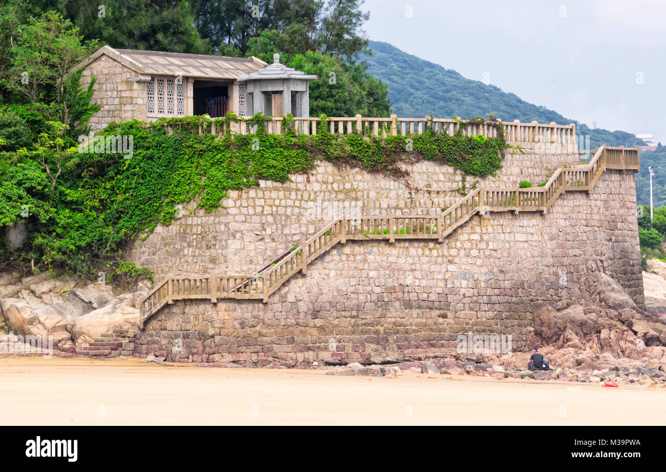 A small building and gazebo on one thousand step beach on the island of ...