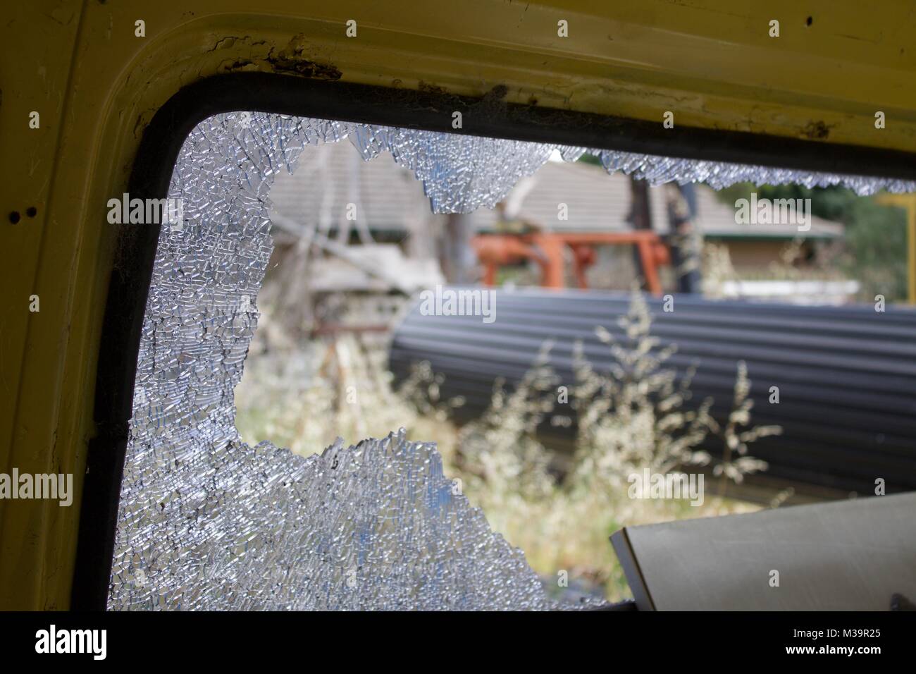Broken window of old van Stock Photo - Alamy
