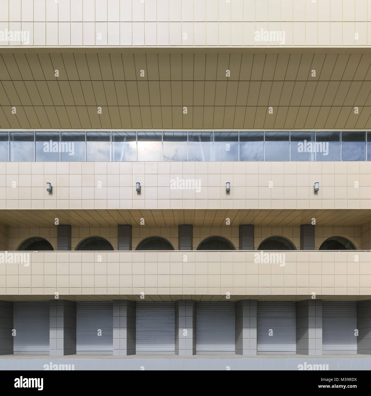 Facade part of a modern building furnitured beige and grey ceramic ...