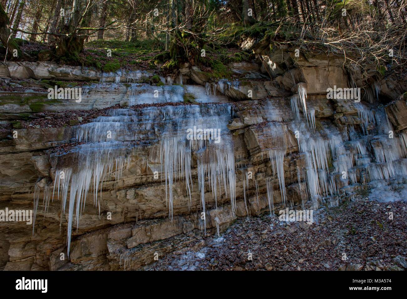 icy rocks with stalactites Stock Photo - Alamy