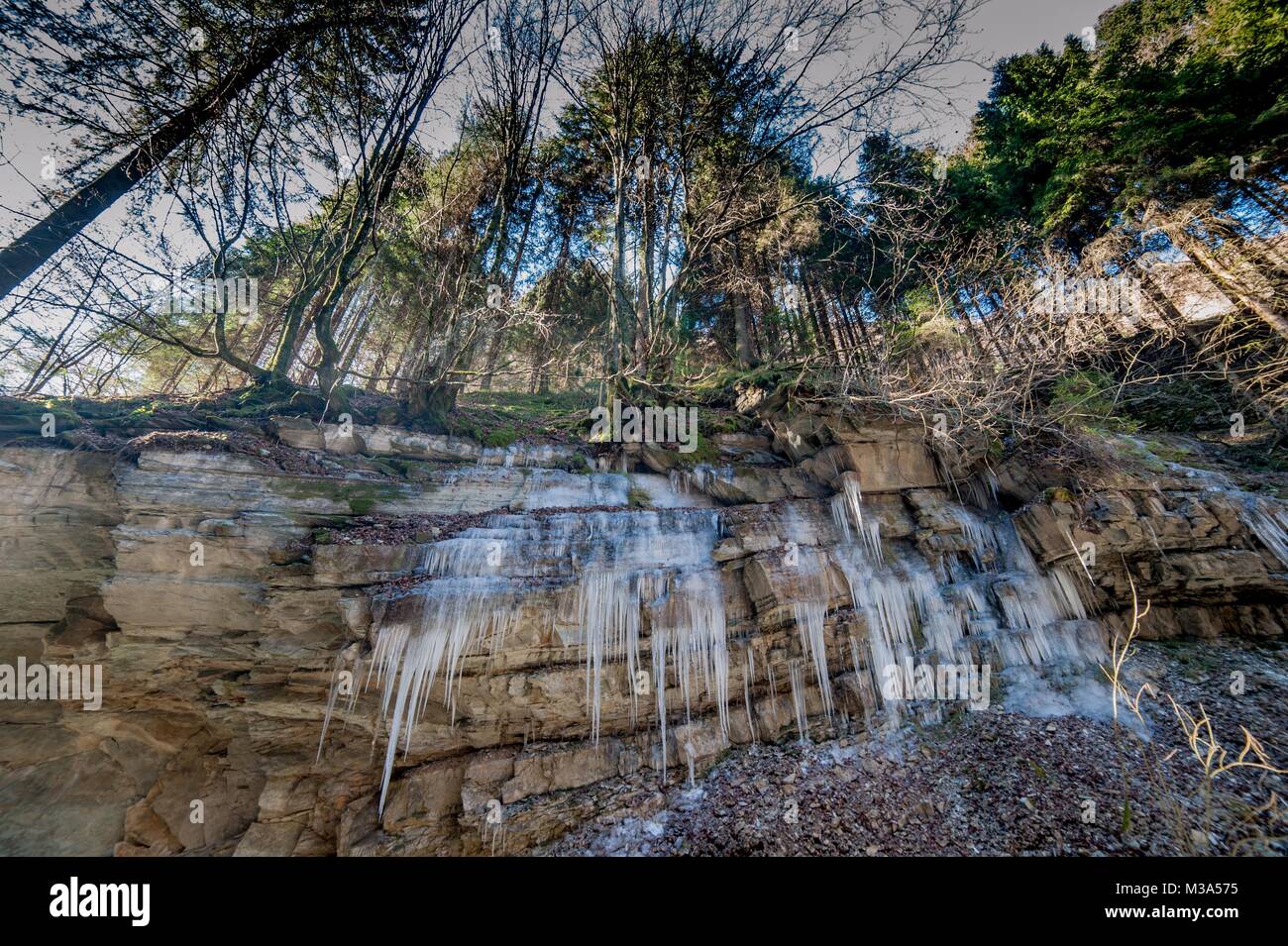 icy rocks with stalactites Stock Photo - Alamy