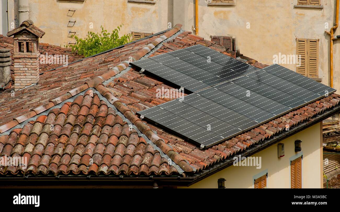 Solar panels on church roof hi-res stock photography and images - Alamy