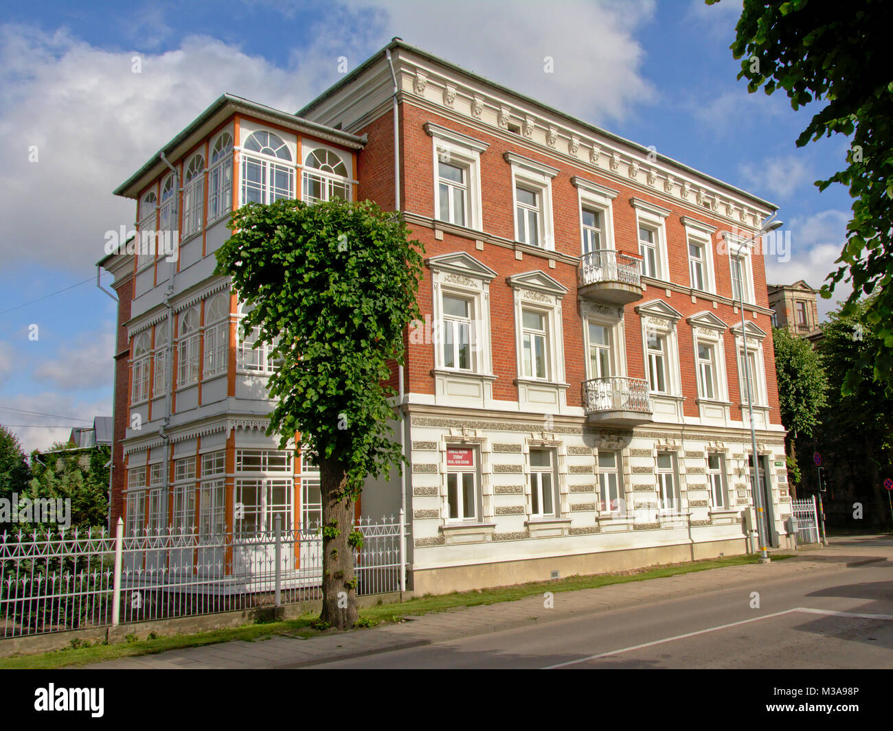 Fancy brick stone neo renaissance building on a sunny day with soft ...