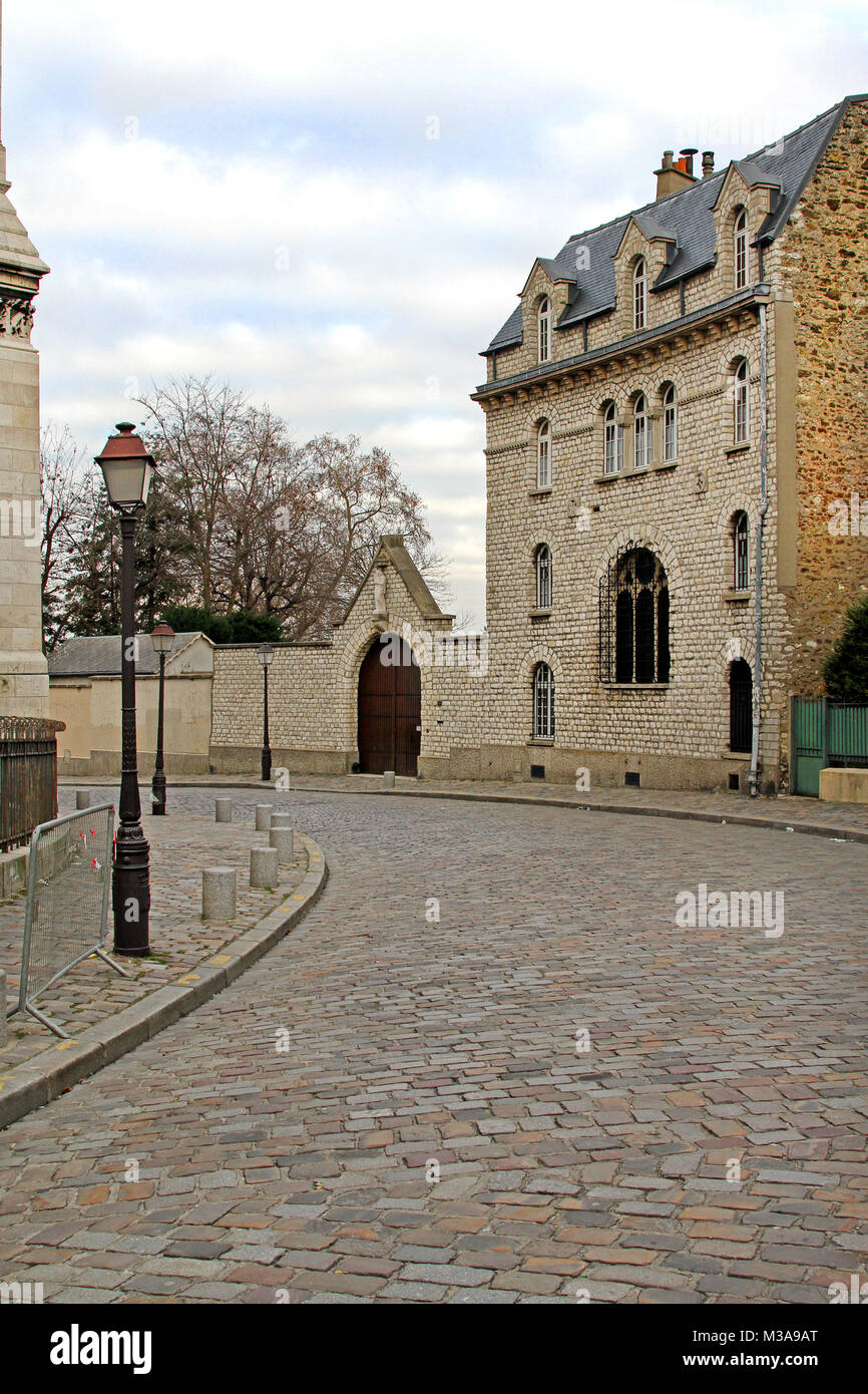 Old street with cobblestone road and retro lamp post Stock Photo - Alamy