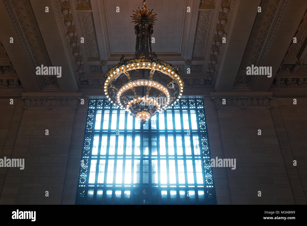 Rustic lamp with window behind Stock Photo - Alamy