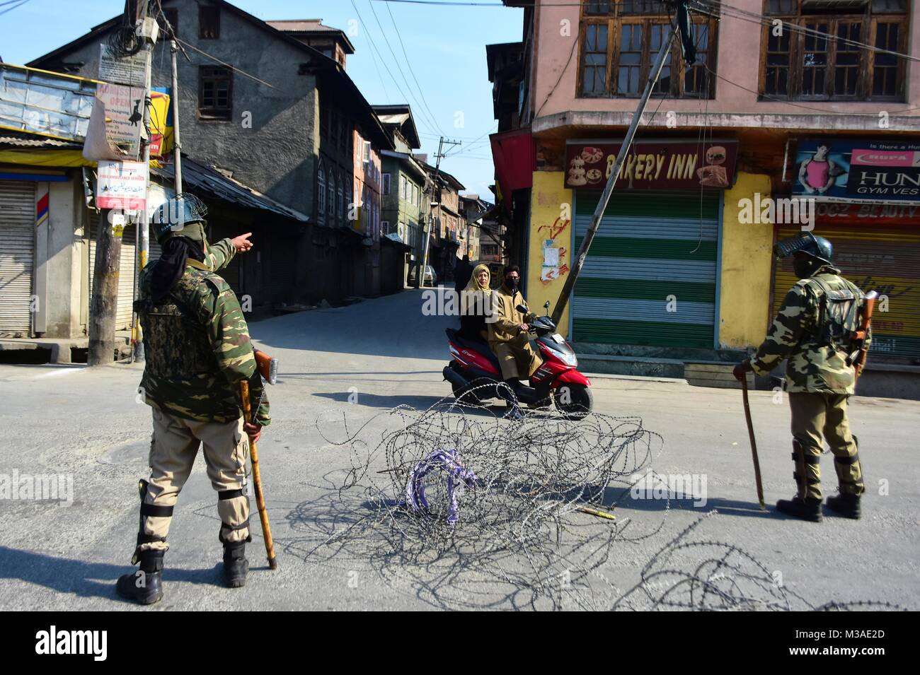 Srinagar, India. 09th Feb, 2018. Indian Forces stop civilians during a ...