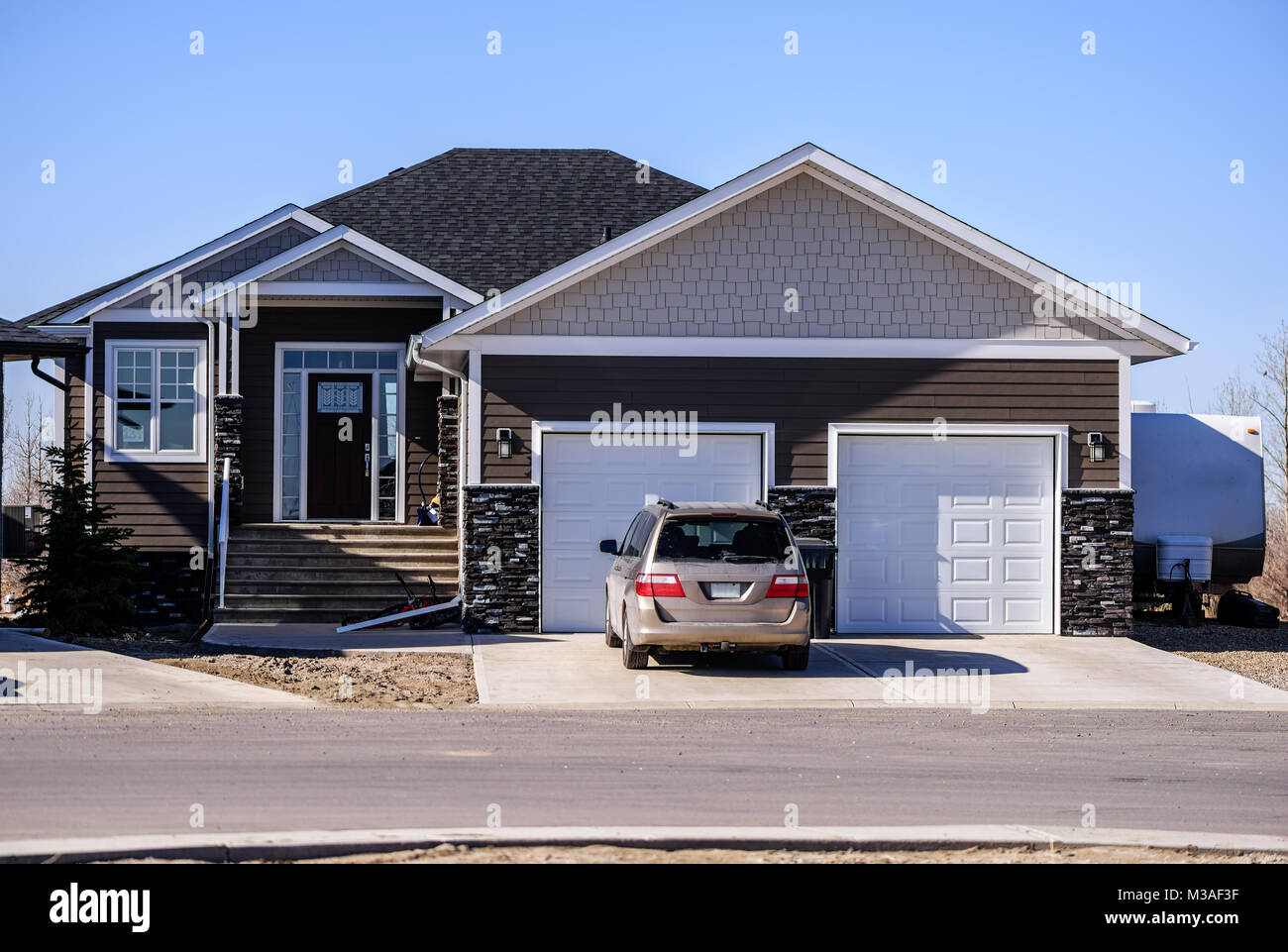 A typical American private house with a garage for a family in a suburb ...