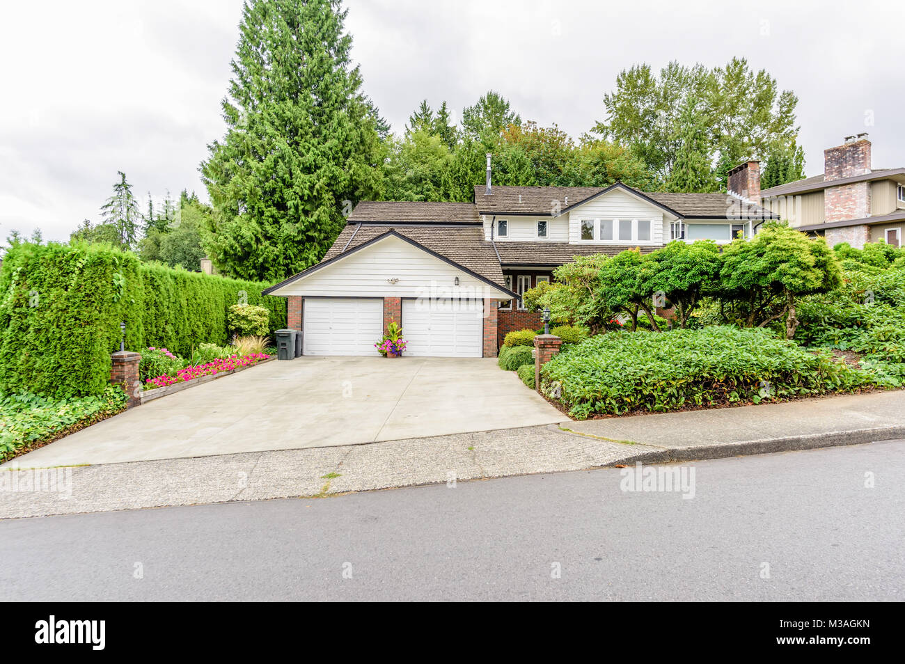 A typical American private house with a garage for a family in a suburb ...