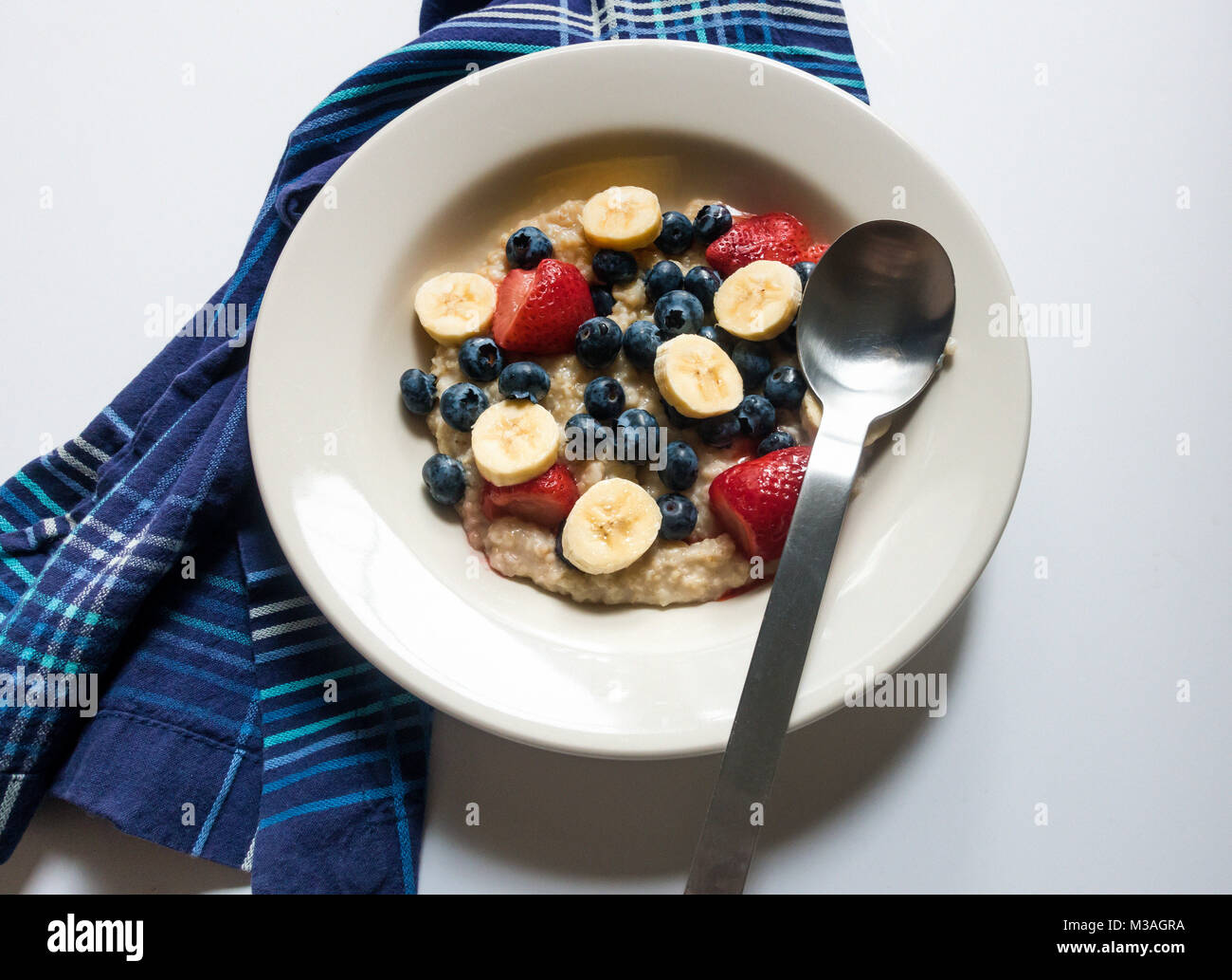 A bowl of porridge and fruit Stock Photo - Alamy