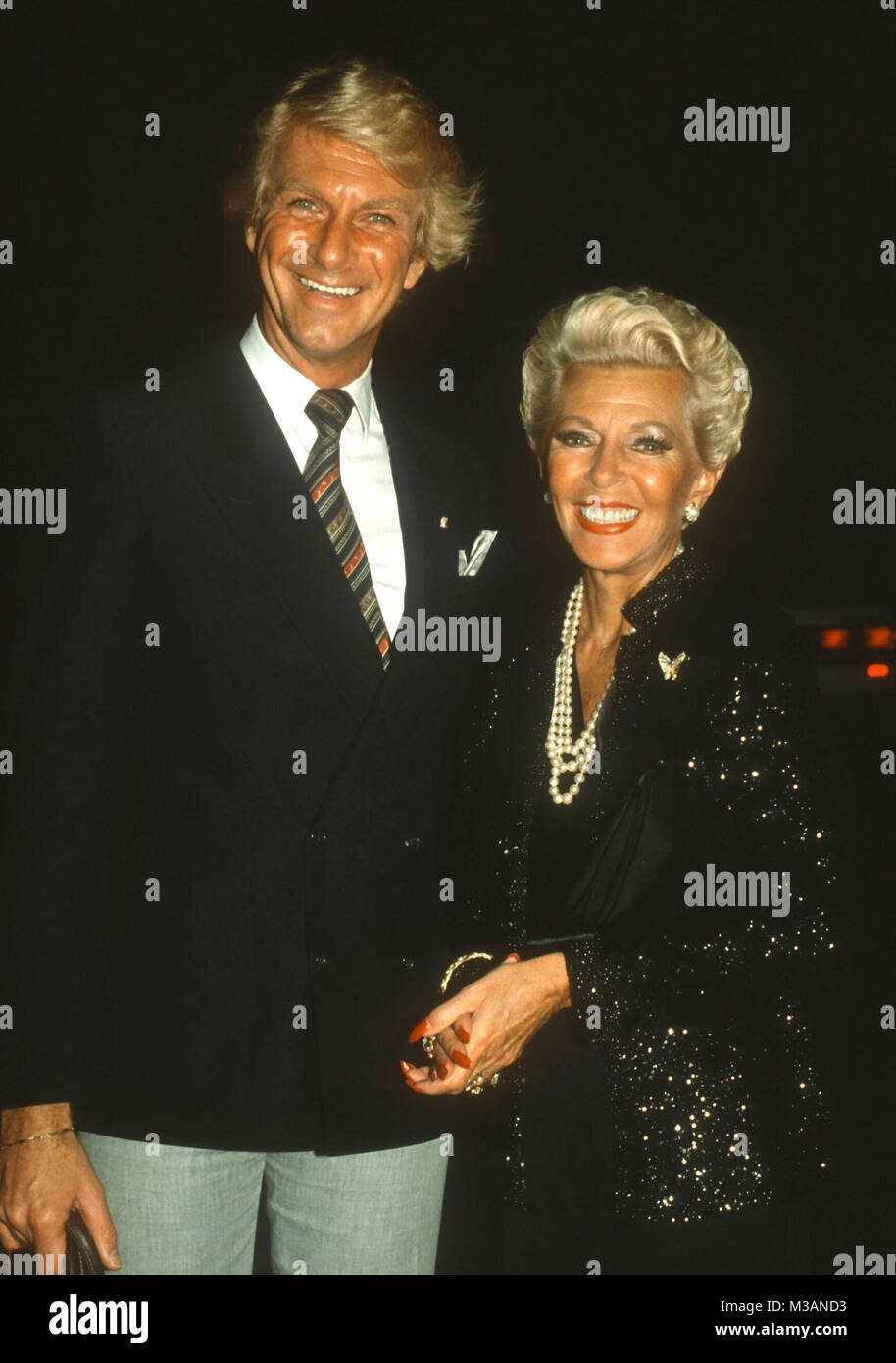 WEST HOLLYWOOD, CA - OCTOBER 7: (L-R) Hairdresser Eric Root and actress ...