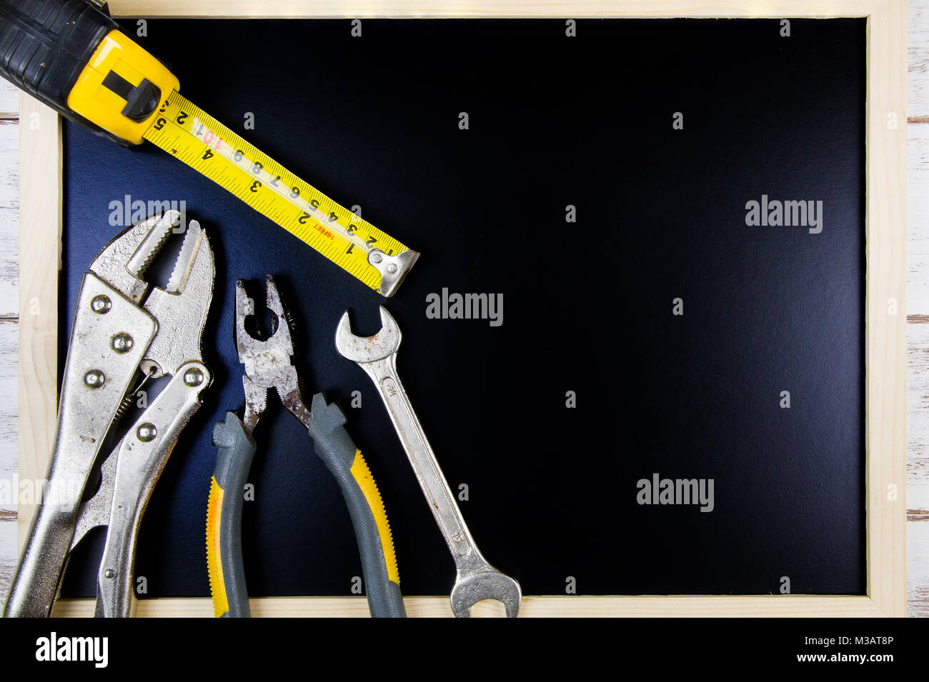 Blank blackboard and Set of repair hand tools.Template mock up for ...
