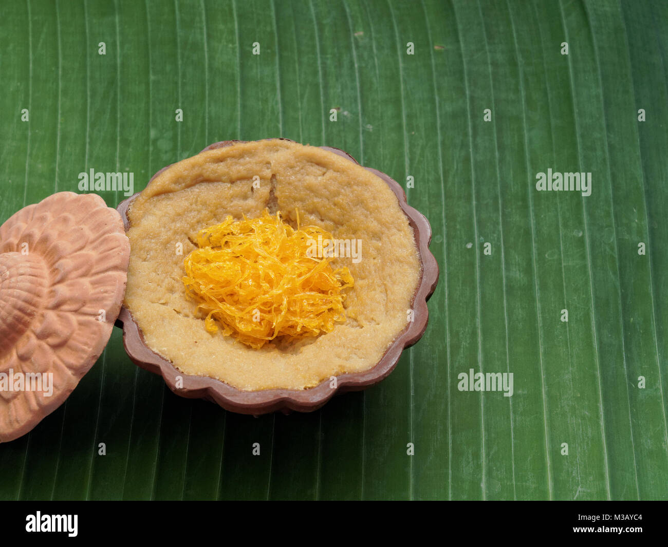 Thai dessert, egg custard with sweet sticky rice topped with golden ...