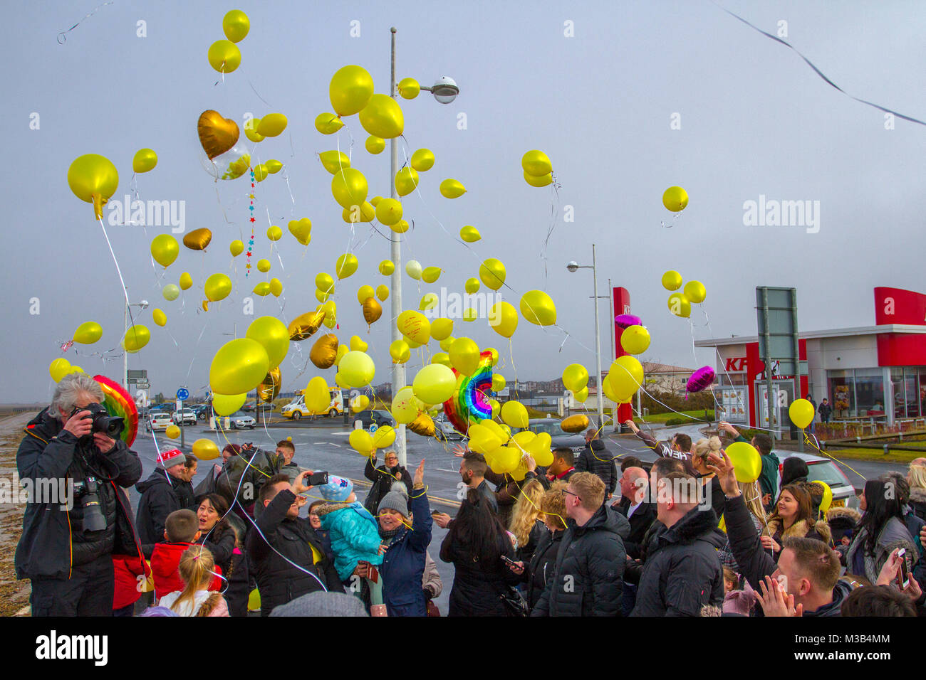 Skies turned yellow today in a balloon release tribute to murdered ...