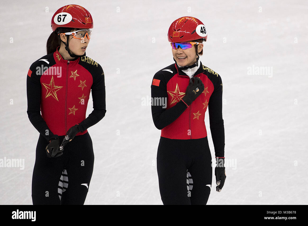 Gangneung, Korea. 10th Feb, 2018. Chunyu Qu (67) and teammate Yutong ...