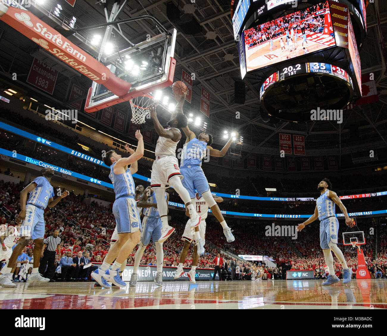 North Carolina State Wolfpack forward Lennard Freeman (1) and North ...