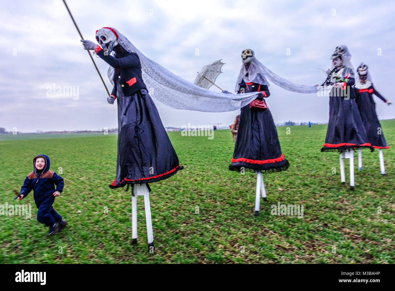 Deaths and child, Czech Carnival mask in a traditional parade, known as ...
