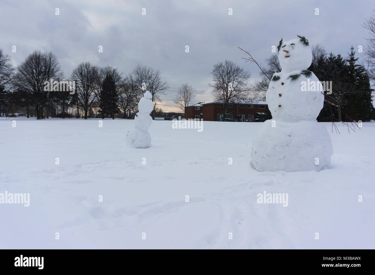 Toronto, Ontario, Canada. 8 February 2018. Snowmen built by kids living ...