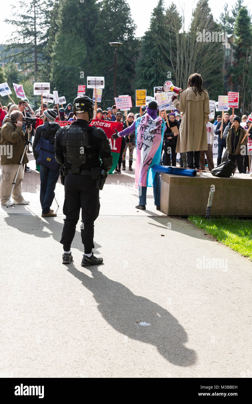 Seattle, Washington, USA. 10th February, 2018. A supporter speaks as ...