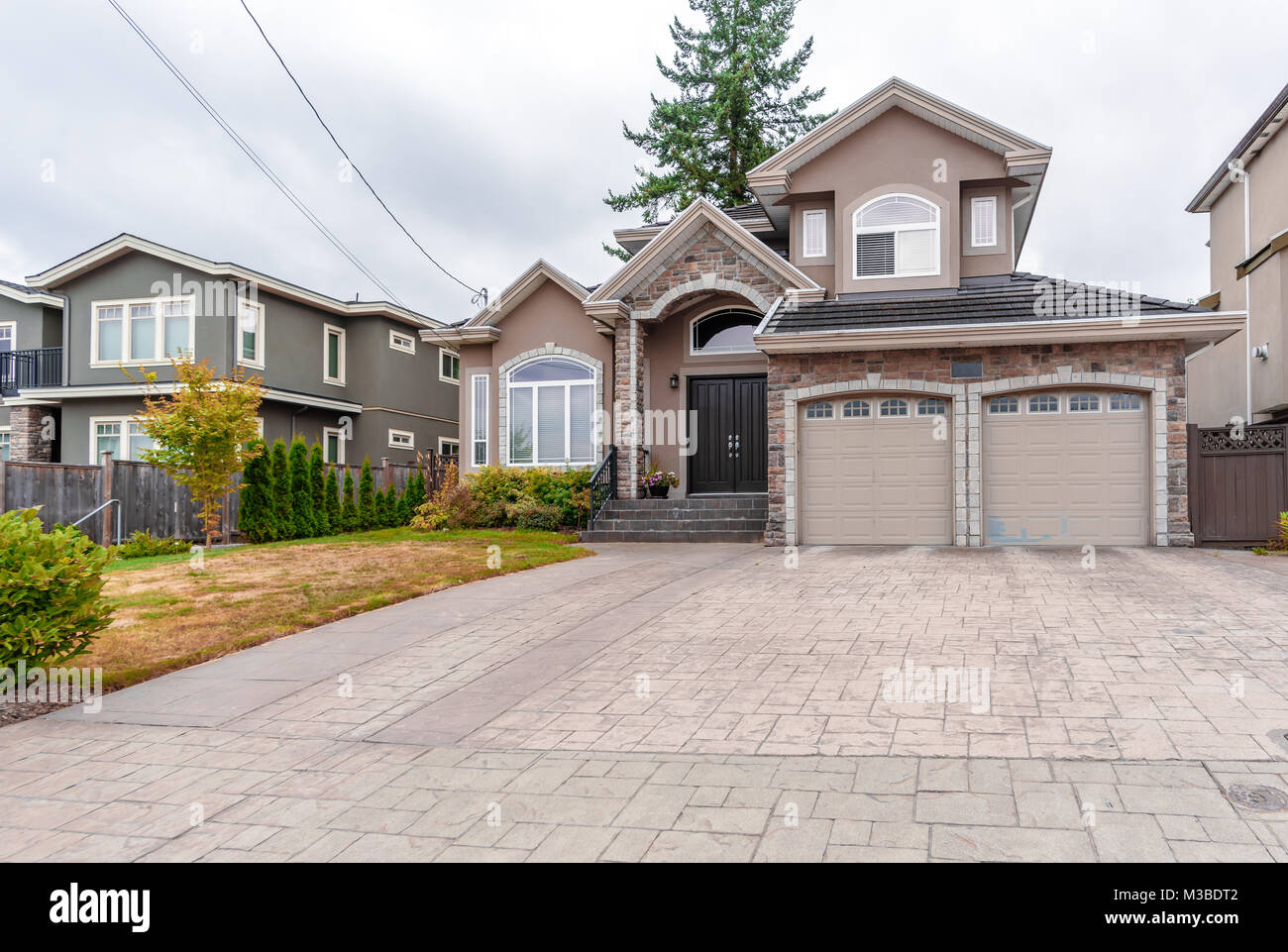 A typical American private house with a garage for a family in a suburb ...
