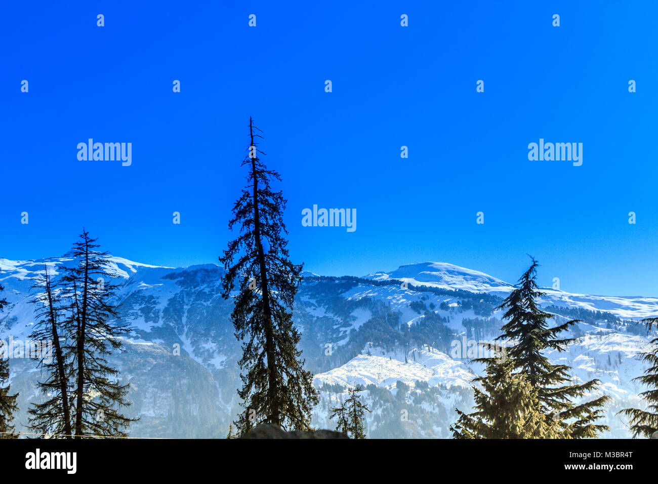 Amazing landscape with mountains sea blue sky sun and beautiful ...